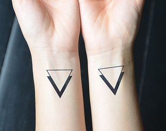 What is the meaning of the tattoo of the two triangles that so many ...