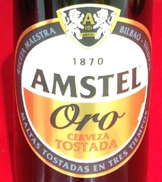 Logotipo De ámstel Oro Llegó La Nueva Amstel, Con Todo El Sabor